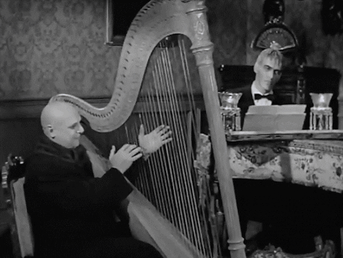 Addams Family Uncle Fester Lurch Lyre Music GIF | GIFDB.com