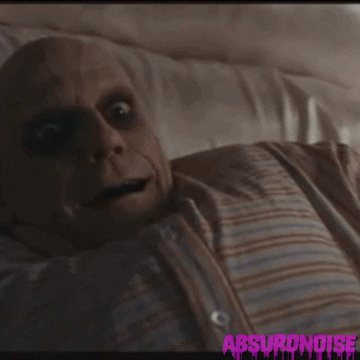 Addams Family Uncle Fester Scared Shocked GIF | GIFDB.com