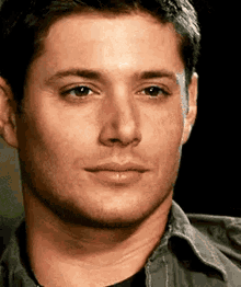 Dean Winchester Sip Glass Smirk GIF | GIFDB.com