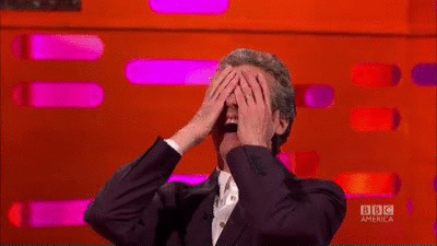 Embarrassed Laughing Reaction Peter Capaldi GIF | GIFDB.com