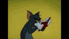 Enrage Tom Reading Book GIF | GIFDB.com