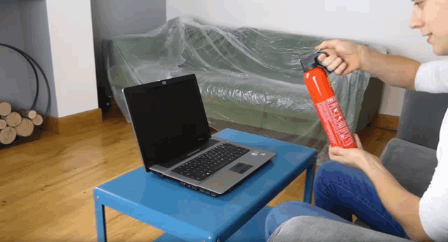 Extinguishing A Laptop Computer GIF | GIFDB.com