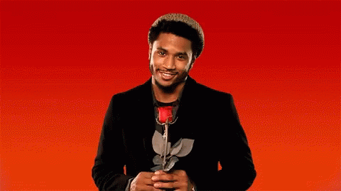 Formal Man Giving Flowers GIF | GIFDB.com