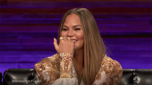 Giggle Covering Laughter Chrissy Teigen GIF | GIFDB.com