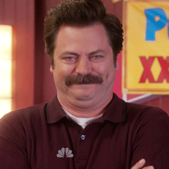 Giggle Ron Swanson Cute Hiding Laughter GIF | GIFDB.com