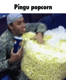 Guy Eating Tons Of Popcorn Meme GIF | GIFDB.com