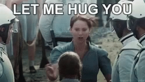 I Volunteer As Tribute Hug Katniss Prim Hunger GIF | GIFDB.com