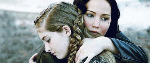 I Volunteer As Tribute Katniss Prim Sister Hug GIF | GIFDB.com