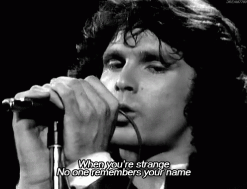 Jim Morrison Singing Sadly GIF | GIFDB.com