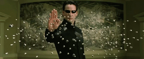 Keanu Reeves Neo Stopping Bullets In The Matrix GIF | GIFDB.com