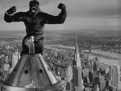 King Kong Beating His Chest On Top Of Building GIF | GIFDB.com