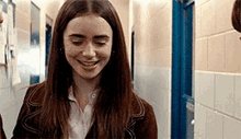 Lily Collins Smiling While Speaking GIF | GIFDB.com