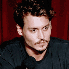 Lip Bite Tease Blink Johnny Depp GIF | GIFDB.com