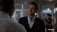 Lucifer Tom Ellis Smiling Look Down GIF | GIFDB.com