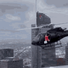 Men Watching Woman Doing Fearless Helicopter Stunt GIF | GIFDB.com