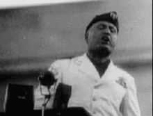 Mussolini Fanning Hand Keep Talking GIF | GIFDB.com