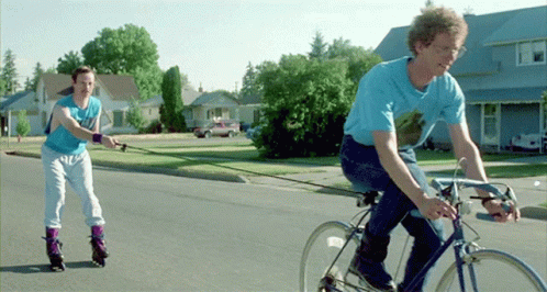 Napoleon Dynamite And Kip Biking And Roller Skating GIF | GIFDB.com