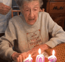 Old Woman Blowing Birthday Candles With Falling Dentures GIF | GIFDB.com