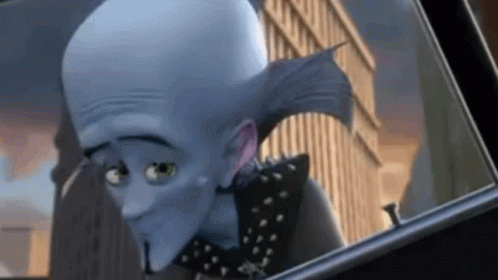 Oops Megamind Fake Smile GIF | GIFDB.com