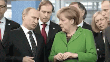 President Putin Talking To Chancellor Angela Merkel GIF | GIFDB.com