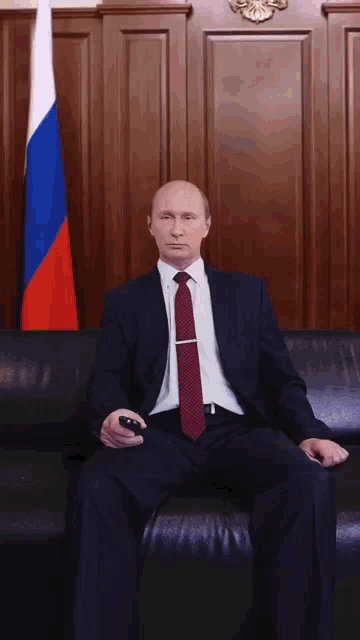 President Vladimir Putin Turning On Tv Using Remote GIF | GIFDB.com