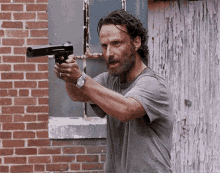 Rick Grimes Walking Dead Pointing Gun GIF | GIFDB.com