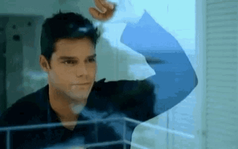 Ricky Martin Binoculars Te Extrano GIF | GIFDB.com