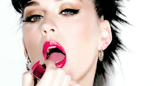 Sophisticated Katy Perry Applying Lipstick GIF | GIFDB.com