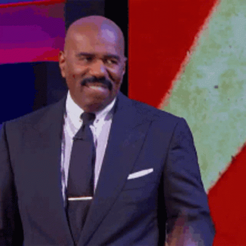 Steve Harvey Laughing Pointing GIF | GIFDB.com