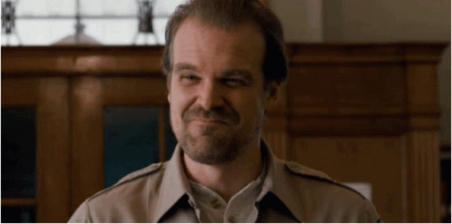 Stranger Things Jim Hopper Smiling GIF | GIFDB.com