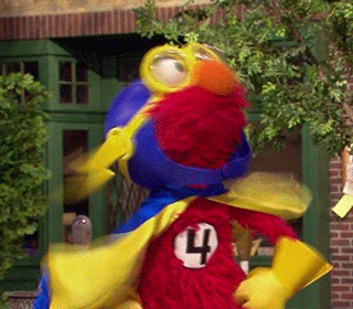 Superhero Elmo Looking Up GIF | GIFDB.com