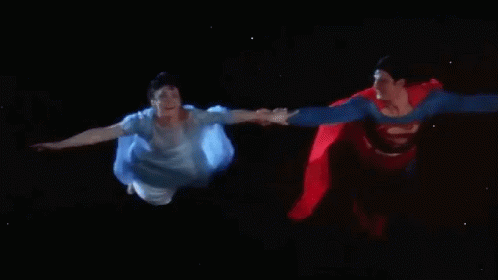Superman Flying A Woman GIF | GIFDB.com