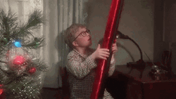 A Christmas Story Ralphie Opening Gift GIF | GIFDB.com