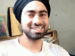 A Man's Staged Smile GIF | GIFDB.com