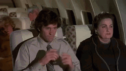 Airplane Movie Ted Striker Pouring Himself GIF | GIFDB.com