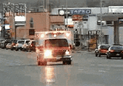 Ambulance Rushing On The Highway GIF | GIFDB.com