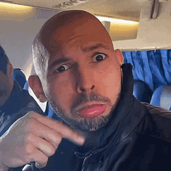 Andrew Tate Slapping Lips GIF | GIFDB.com