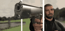 Animated Drake Holding A Gun GIF | GIFDB.com