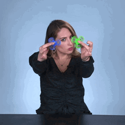 Beautiful Lady Playing Fidget Spinner GIF | GIFDB.com