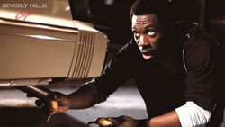 Beverly Hills Cop Axel Winking GIF | GIFDB.com
