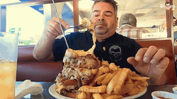 Big Guy Ed Eating Food GIF | GIFDB.com