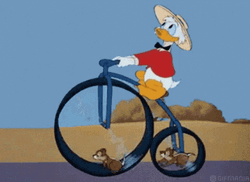Vintage Bike Riding Donald Duck GIF | GIFDB.com