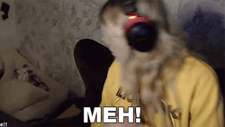 Blonde Girl Saying Meh GIF | GIFDB.com