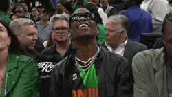 Boston Fan Rapper Travis Scott Waving GIF | GIFDB.com