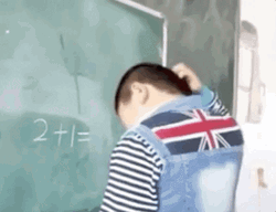 Boy Calculating And Confused While Facing The Board GIF | GIFDB.com