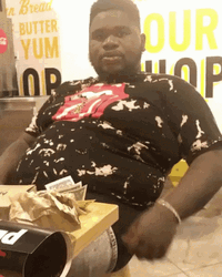 Bread Eating Black Man Falling Over GIF | GIFDB.com