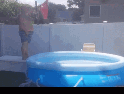 Cannonball Dive In An Inflatable Pool GIF | GIFDB.com