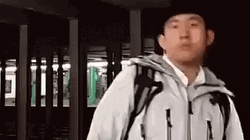 Chinese Man Wearing Jacket Says Okay GIF | GIFDB.com