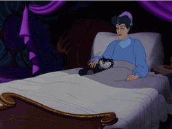 Cinderella's Stepmom Resting In Bed GIF | GIFDB.com