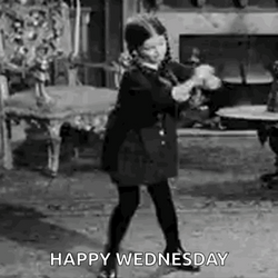 Classic Wednesday Addams Foot Shuffle Dancing GIF | GIFDB.com